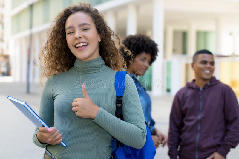 Successful German Female Student with Backpack and Group of ...