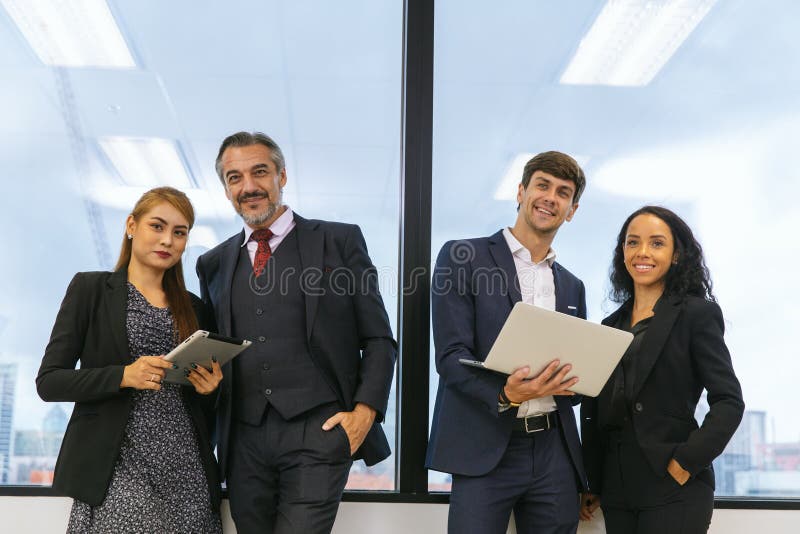 Successful Group of Business People at Modern Office. Team Brainstorm ...