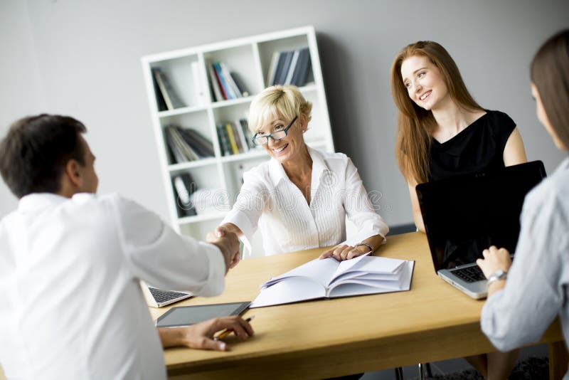 Successful Group of Business People Working on Plans Stock Image ...