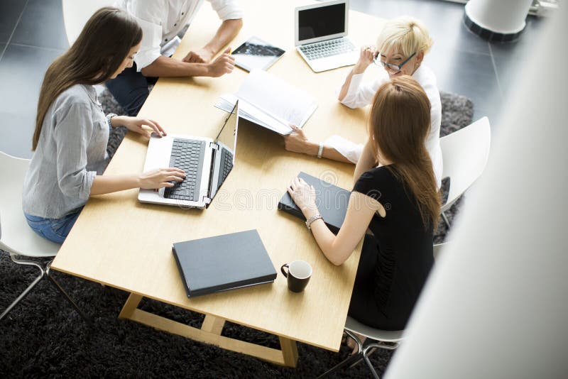 Successful Group of Business People Working on Plans Stock Image ...