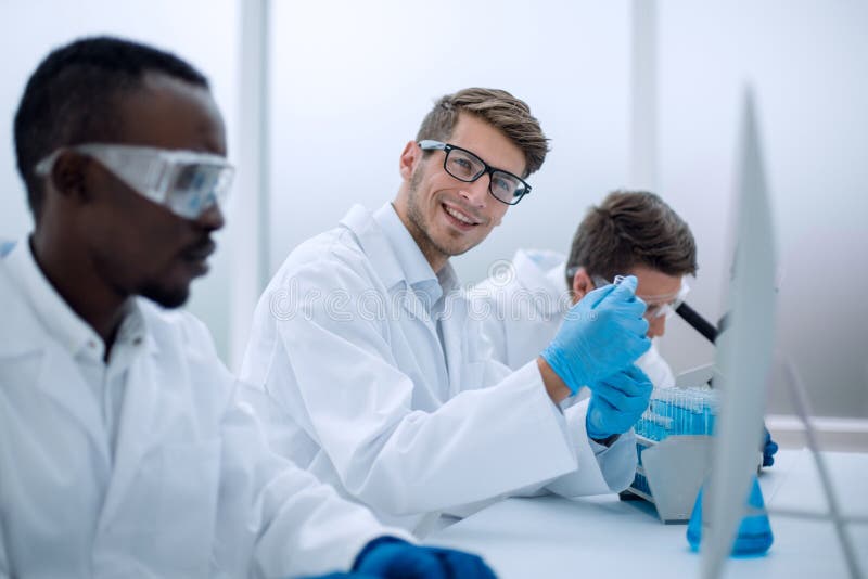 Successful Group Conducts Research in the Laboratory Stock Photo ...