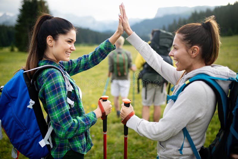Successful Group of Happy Friends on Mountain Top, Cheering Stock Image ...