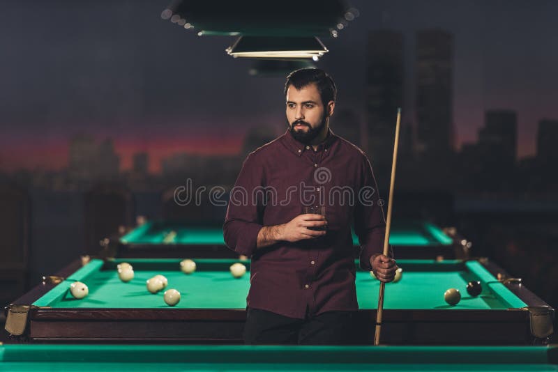 Successful Handsome Man Standing beside Pool Table with Drink Stock ...