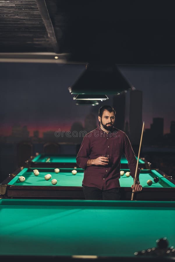 Successful Handsome Man Standing beside Pool Table with Drink Stock ...