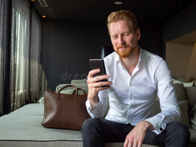 Successful Happy Businessman Using Mobile Phone in Office Stock Photo ...