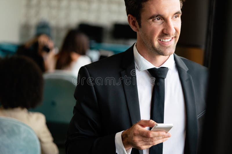 Successful Happy Businessman Using Mobile Phone in Office Stock Image ...