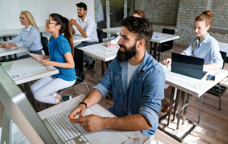 Successful Happy Group of People Learning Software Engineering and ...