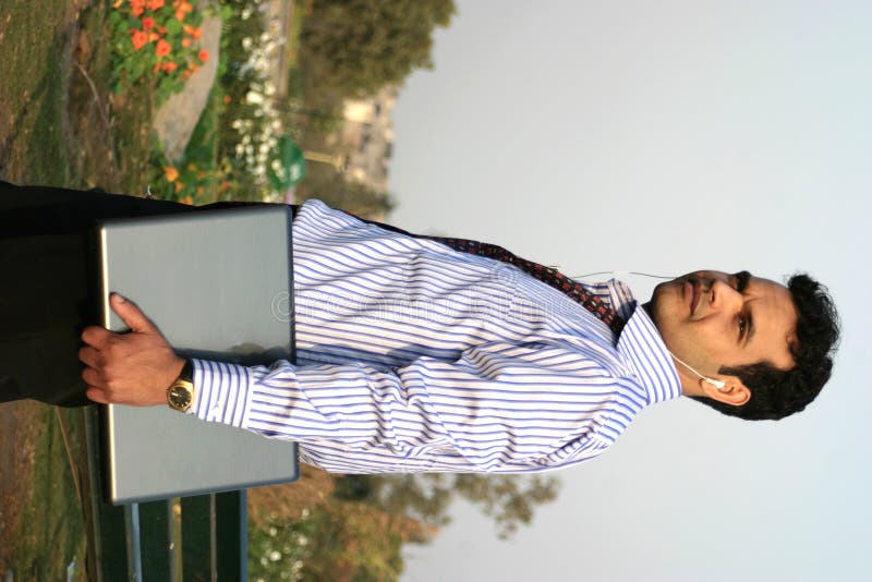 Indian Business Man Meditating Stock Photo - Image of enjoy, music: 4735454