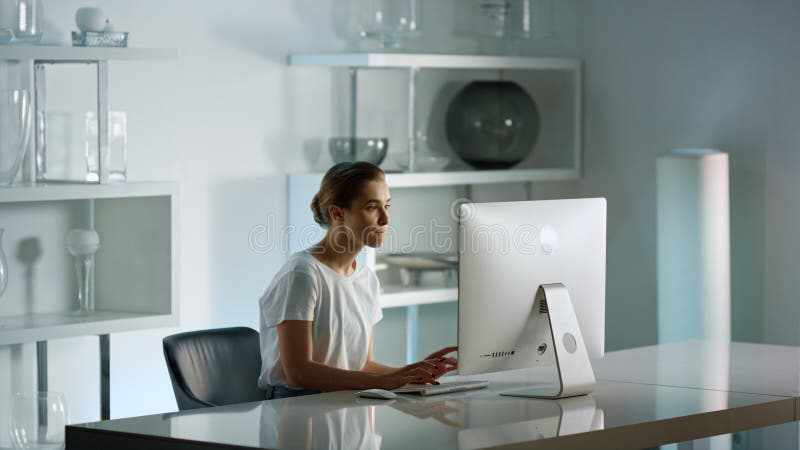 Successful Lady Writing Email. Interior Designer Working on Computer in ...