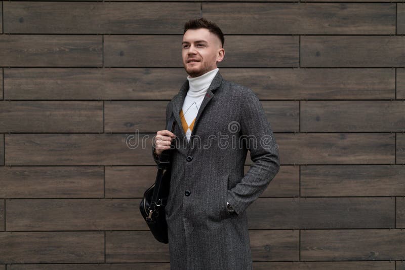 Successful Male Architect with a Bag on His Shoulder Against a Dark ...