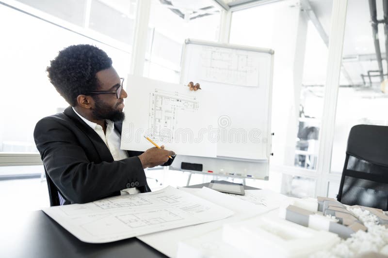 Successful Man Architect Working on Estate Construction Project in the ...
