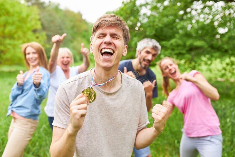 Successful Man with Medal and Winner Team Stock Photo - Image of sport ...