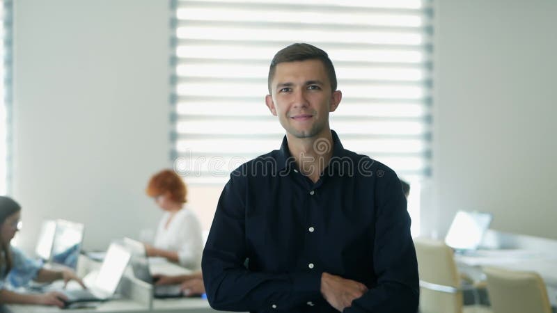 Successful Man in the Office, Looking at the Camera and Smiling Stock ...