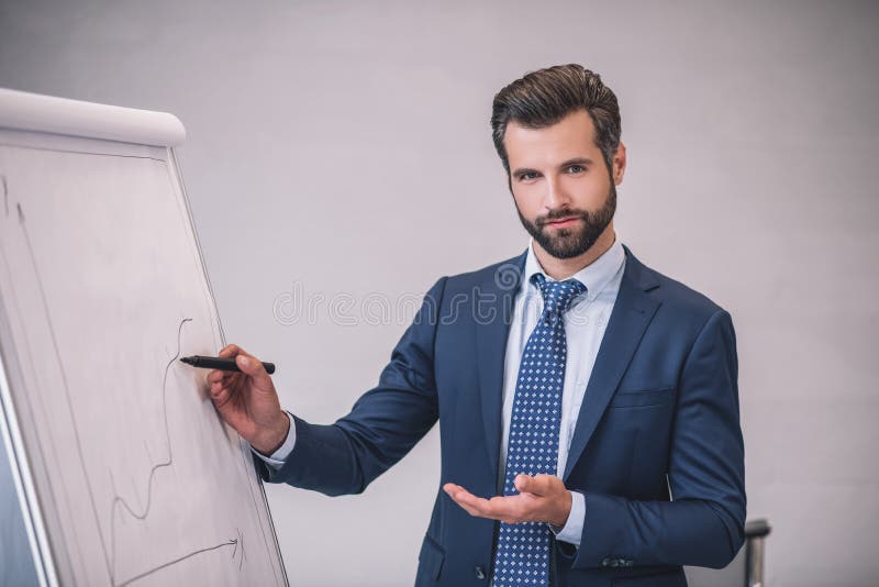 Successful Man Showing Drawn Graph at Stand Stock Image - Image of ...