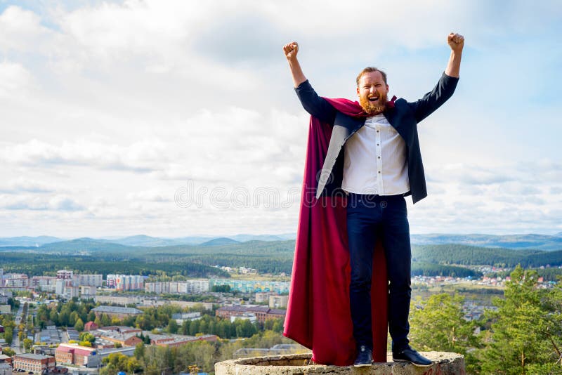 Successful man with a cape stock photo. Image of determined - 105410220