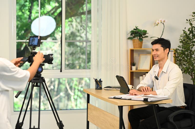 Successful Millennial Entrepreneur Speaking on Camera during Office ...