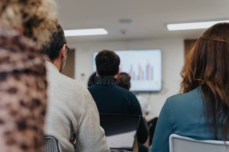 Successful Multi Generational Team Analyzing Growth and Brainstorming ...