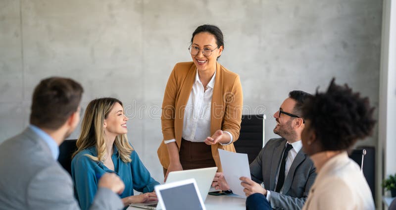 Successful Business Professionals Presenting Analytical Report, Working ...