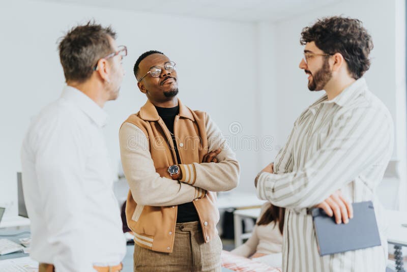 Successful Multigenerational Group of Colleagues Working Together on ...