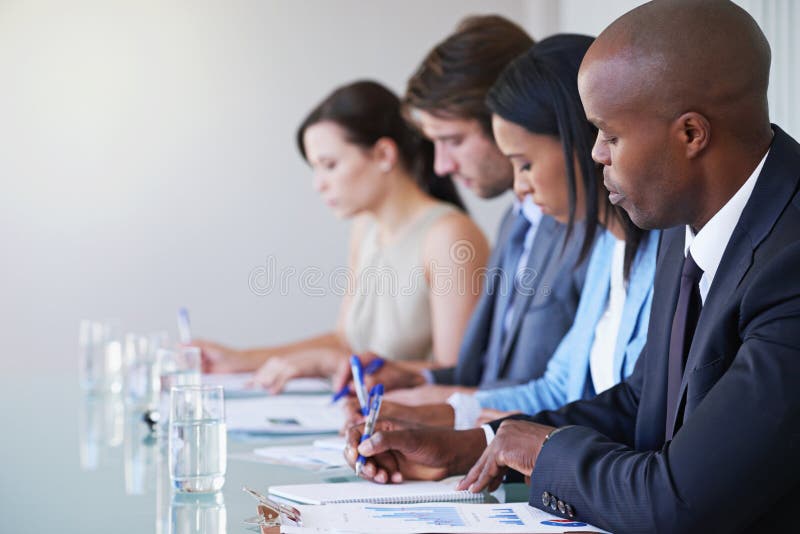 Successful People Take Notes in Meetings. a Row of Businesspeople ...