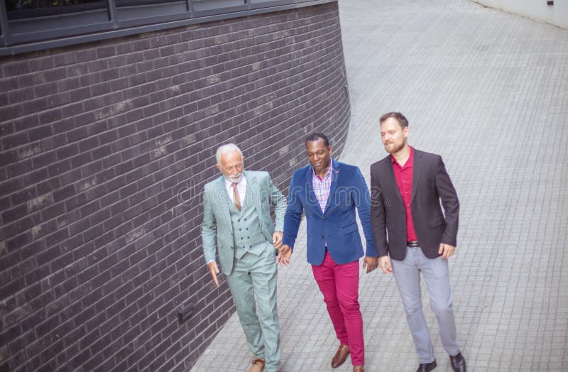 Successful People. Three Business Men Talking and Walking. Above View ...