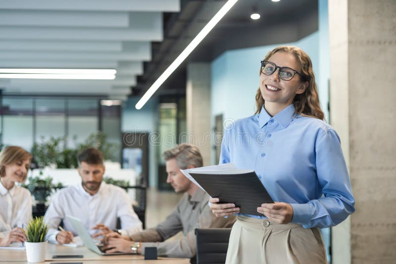 Successful Smiling Female Ceo is Standing in Modern Office and Looking ...