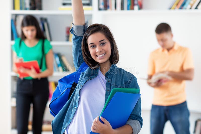 Smart Spanish Female Student Learning with Group of Students Stock ...