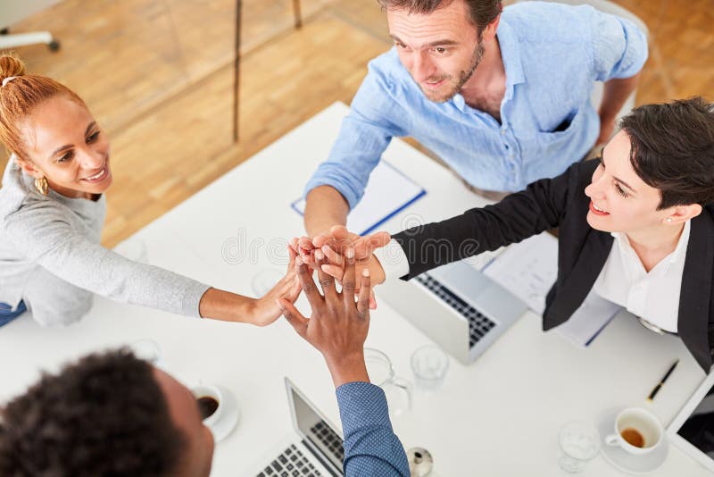 Successful Start-up Team Gives Itself a High Five Stock Photo - Image ...
