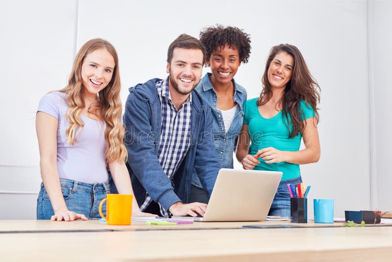 Successful Start-up Team at Laptop Computer Stock Photo - Image of team ...