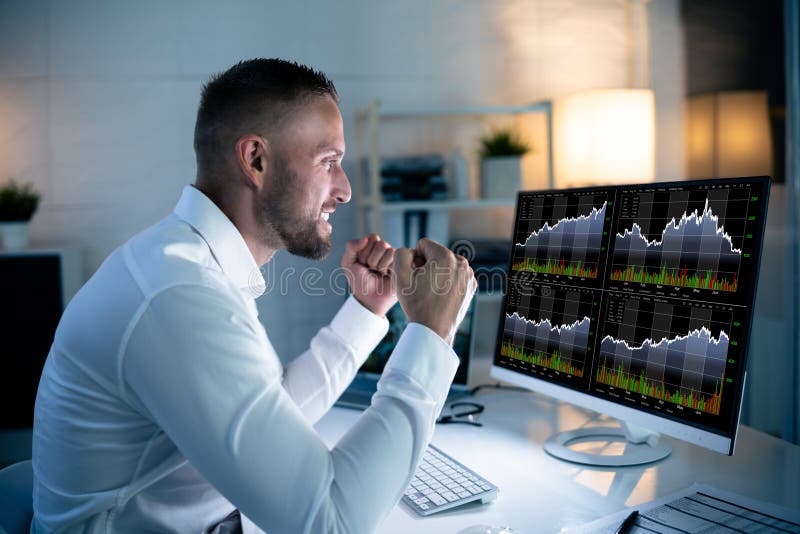 Successful Stock Market Trader Looking at Graphs Stock Photo - Image of ...