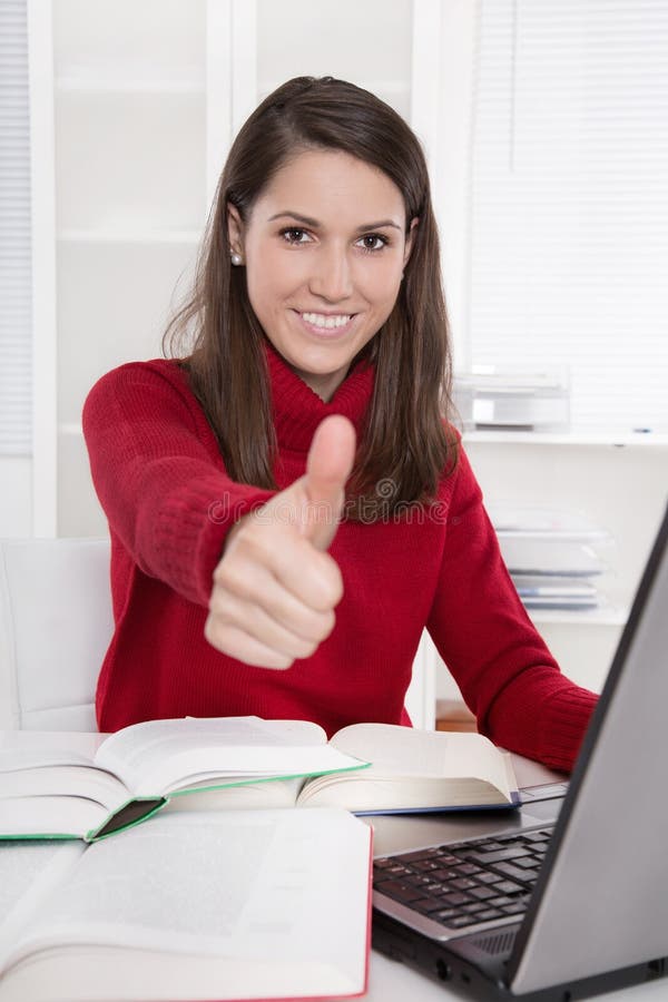 Successful Student in Front of Her Computer with Thump Up. Stock Image ...