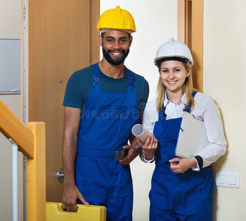 Successful Team of Builders Standing at Entrance Stock Image - Image of ...