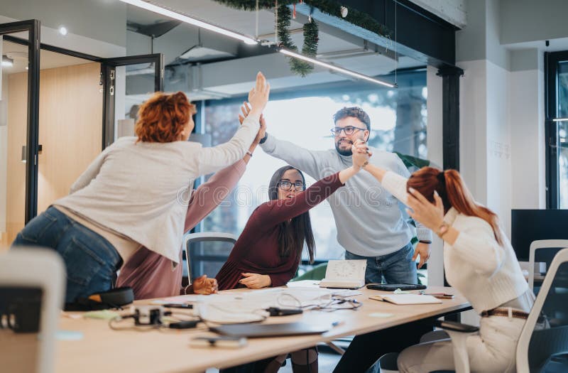 Multicultural Team Celebrates Successful Project with Smiles and ...