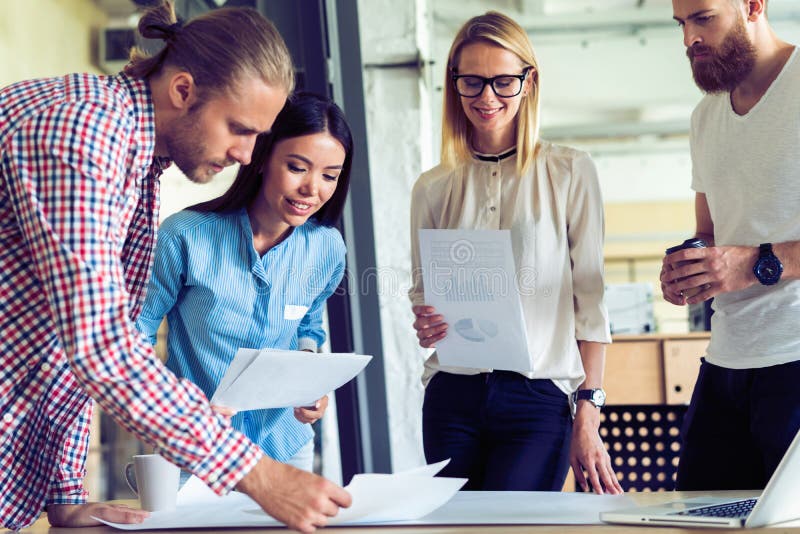 Successful Team. Group of Young Business People Working and ...