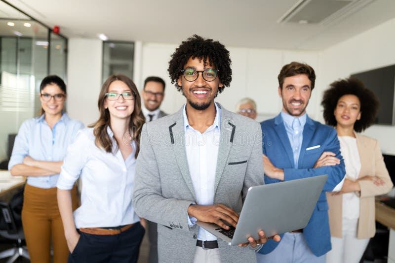 Successful Team of Young Perspective Businesspeople in Office Stock ...