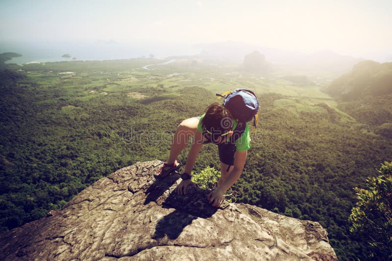 Woman Backpacker Climbing Up on Mountain Rock Stock Image - Image of ...