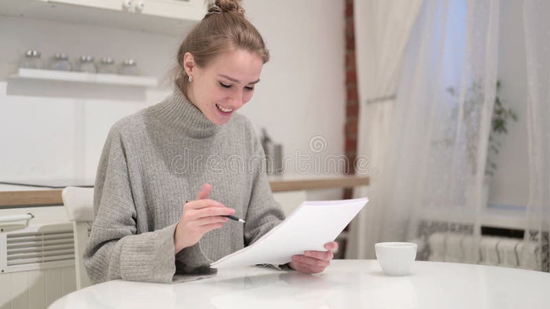 Successful Woman Reading Documents and Celebrating Stock Photo - Image ...