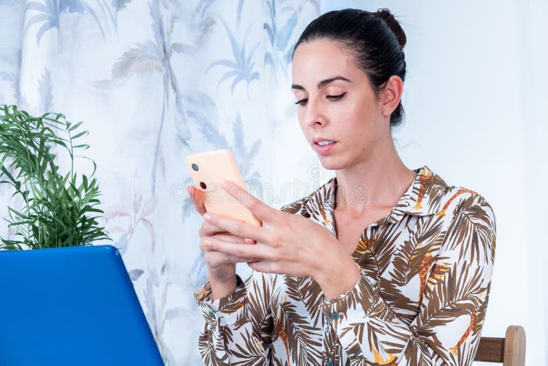 Successful Young and Creative Female Boss Using PC at Her Workplace in ...