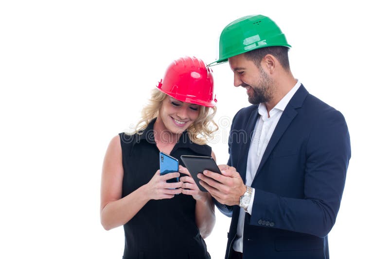 Successful Young Engineers with Mobile Communication Devices Isolated ...