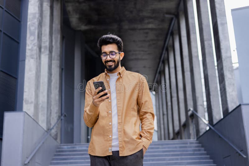 Successful Young Hindu Man Walking Outside Office Building, Engineer ...