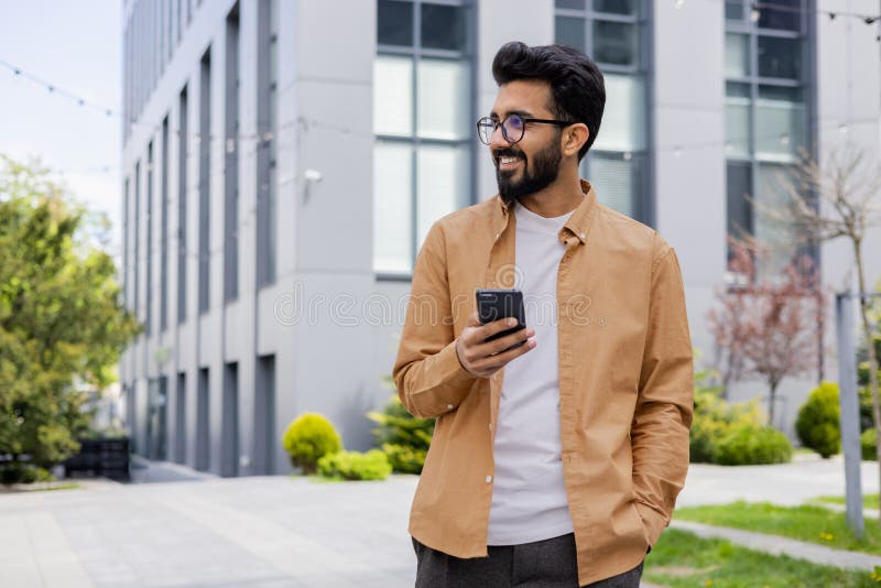 Successful Young Hindu Man Walking Outside Office Building, Engineer ...
