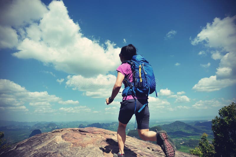 Woman Backpacker Running on Mountain Peak Stock Image - Image of girl ...