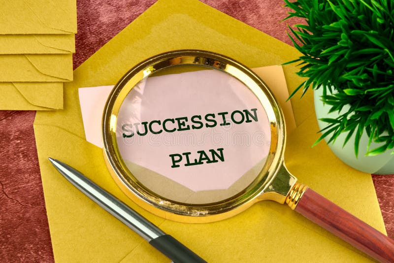 SUCCESSION PLAN Word Alphabet Letters on a Piece of Paper from an ...