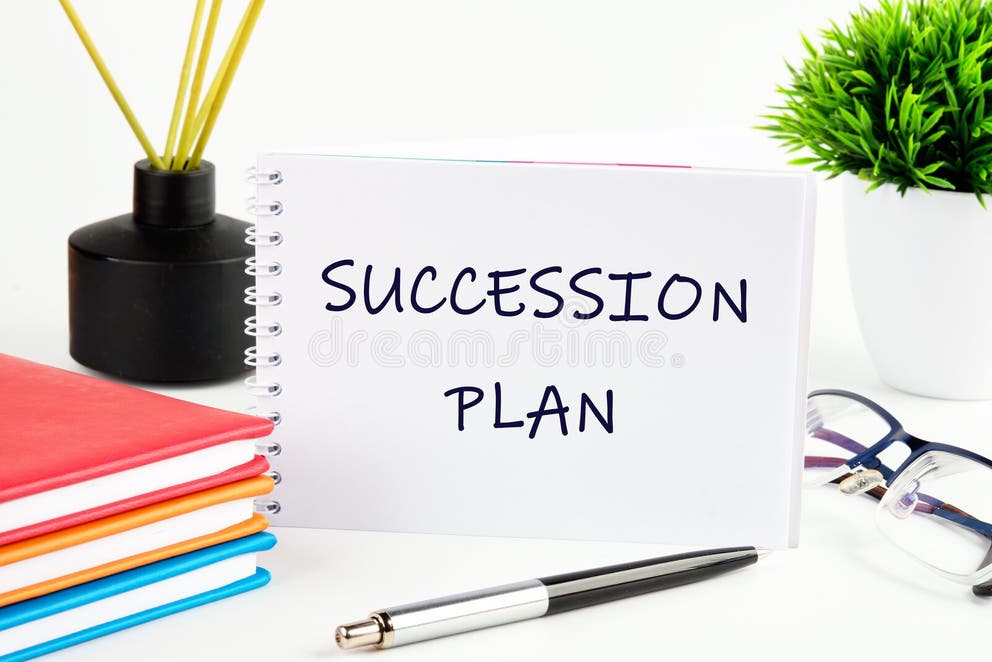 SUCCESSION PLAN Word Alphabet Letters on a White Sheet of an Open ...