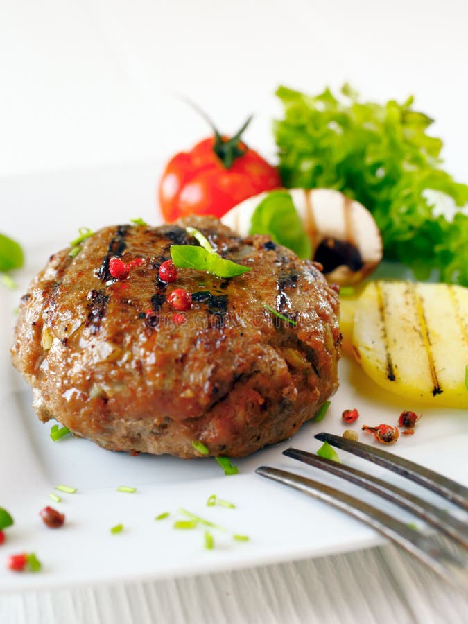 Succulent Cooked Beef Burger on a White Plate Stock Image - Image of ...