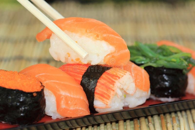 Suchi with chopsticks stock image. Image of fillet, food - 37437171