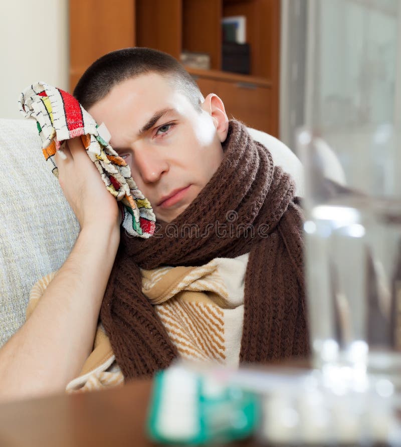 Suffering Man Stuping Towel To Head after Party Stock Photo - Image of ...