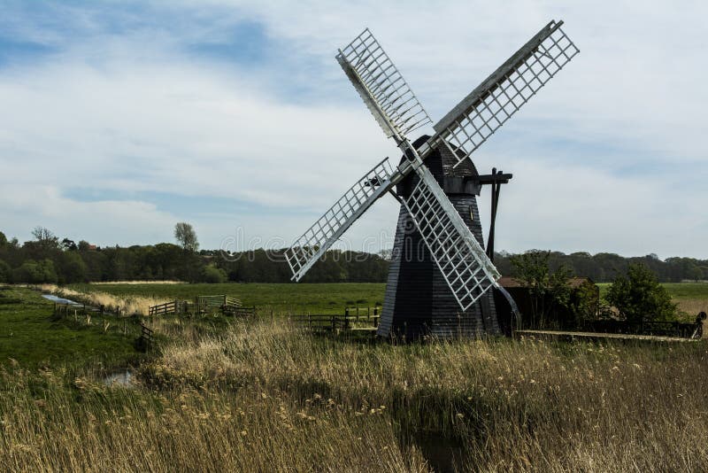 Suffolk Coastal Smock Windmill in Summer Stock Image - Image of coastal ...