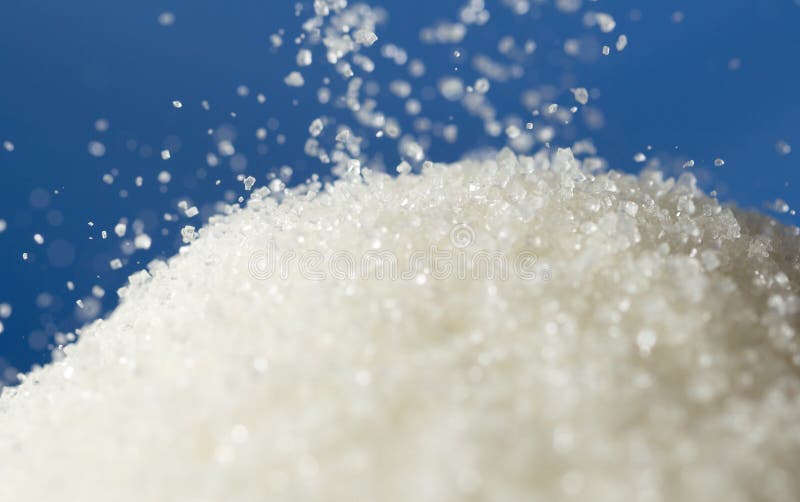 Sugar on a blue background stock image. Image of white - 100383363