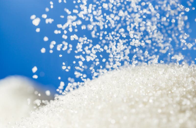Sugar on a blue background stock image. Image of blue - 100388055